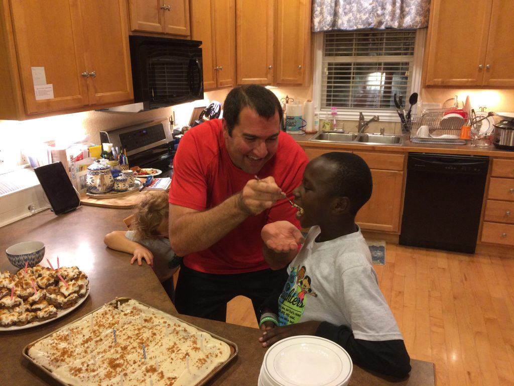 uncle-mikey-feeding-his-first-bite-of-birthday-desert-a-kenyan ...