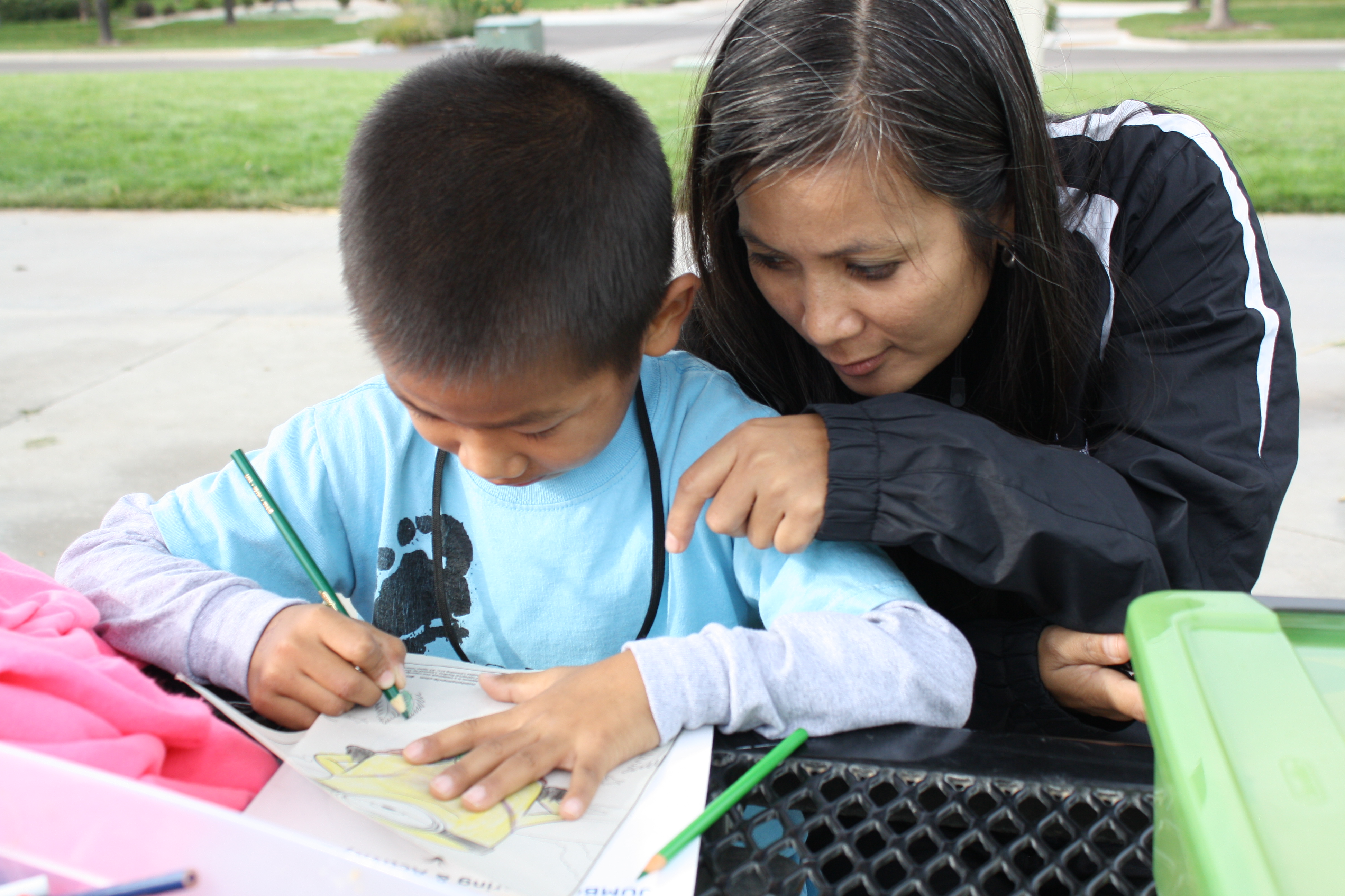 auntie-helen-teaching-mawimawia-how-to-color-in-the-lines_37536463096_o